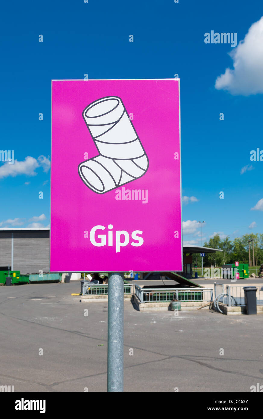 shield with gypsum cast symbol at a household waste processor Stock ...