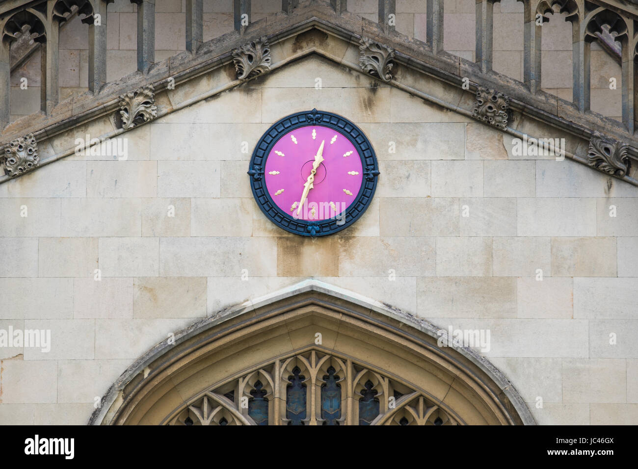 Clock above the entrance to the chapel of Corpus Christi college ...