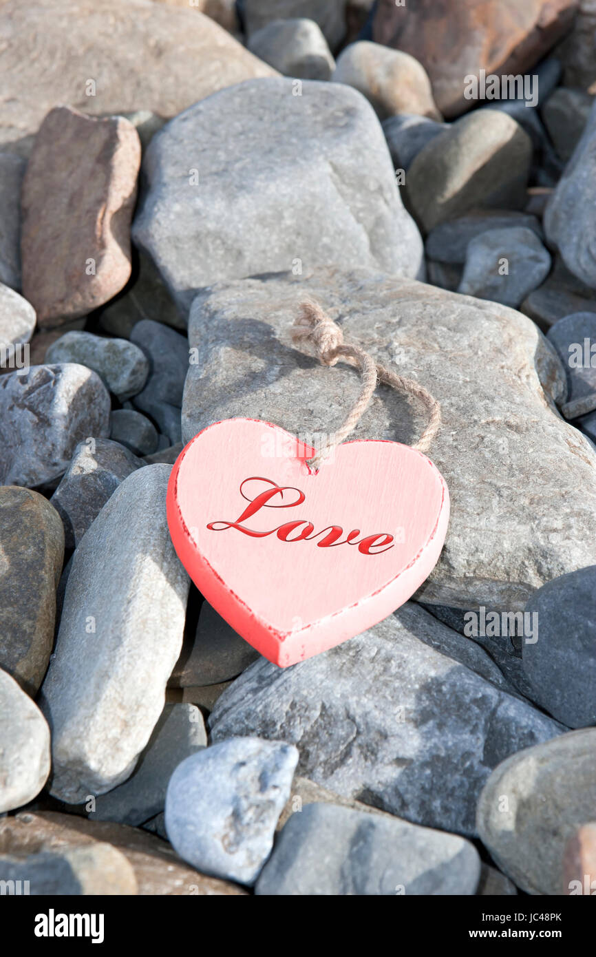 Pink heart of pebbles hi-res stock photography and images - Alamy