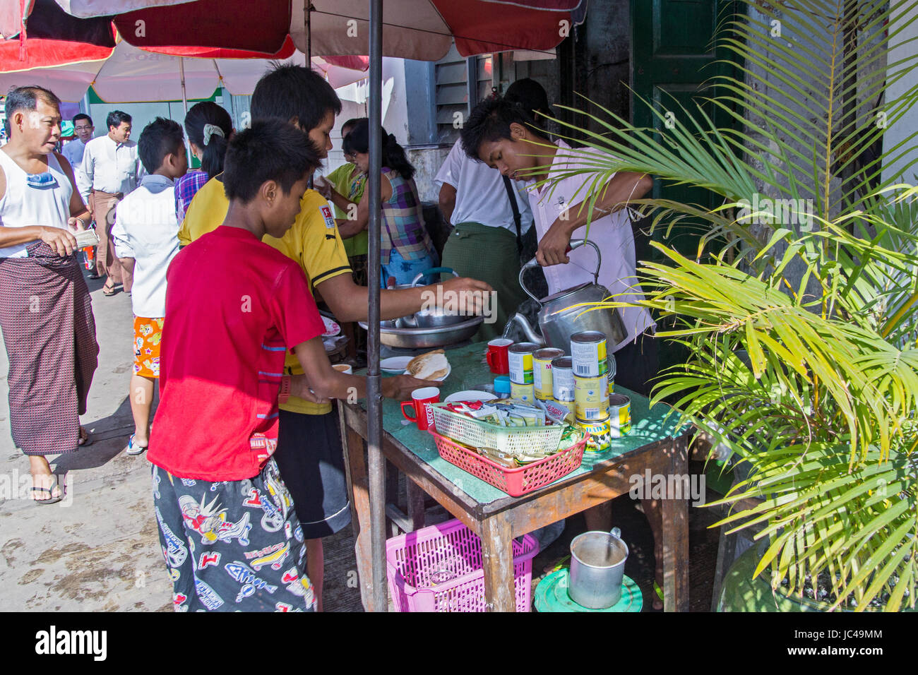 Yangon, Myanmar, hot tea vendor Stock Photo - Alamy