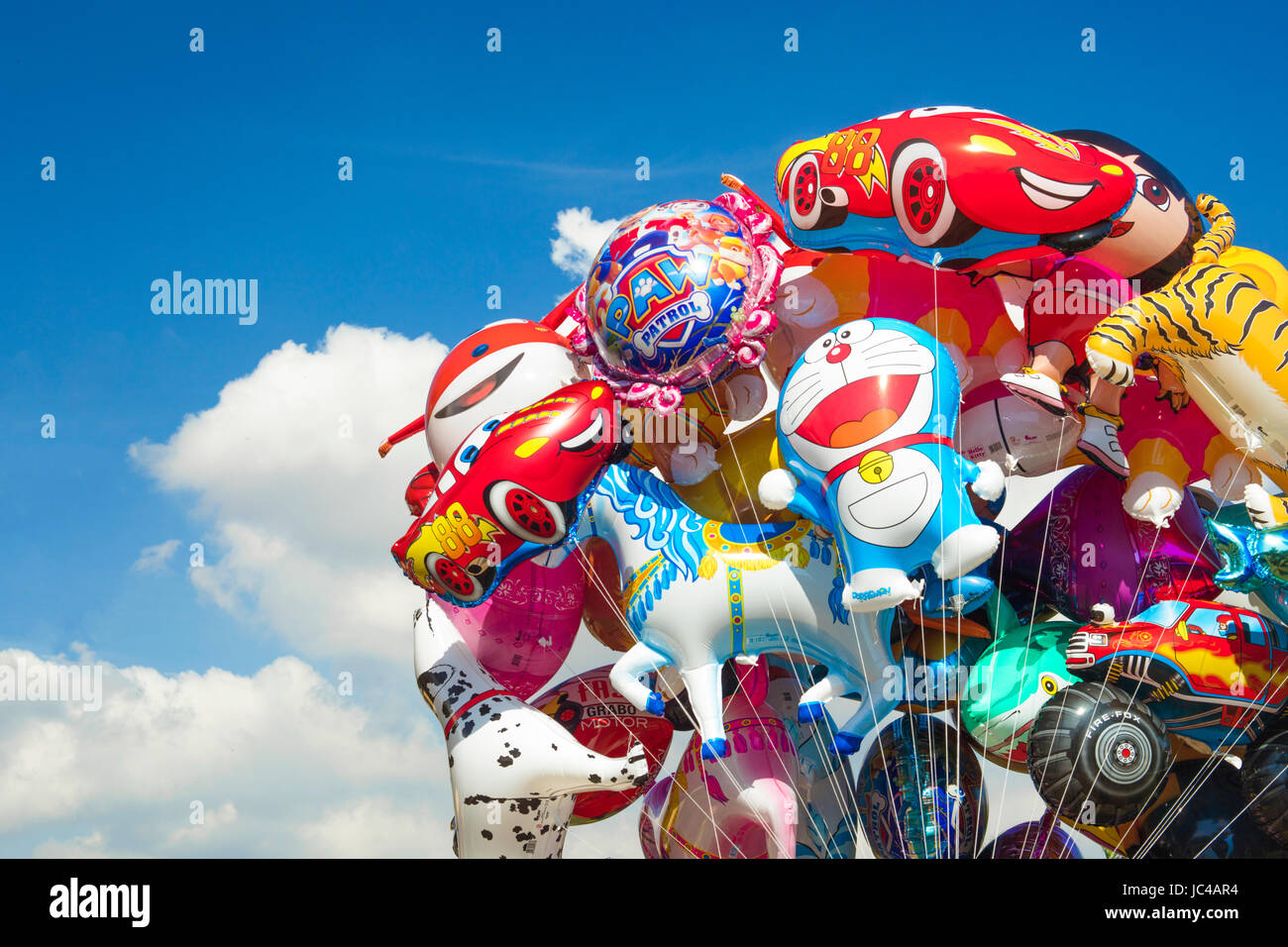Detail of balloons of popular cartoons, which are sold to children at ...