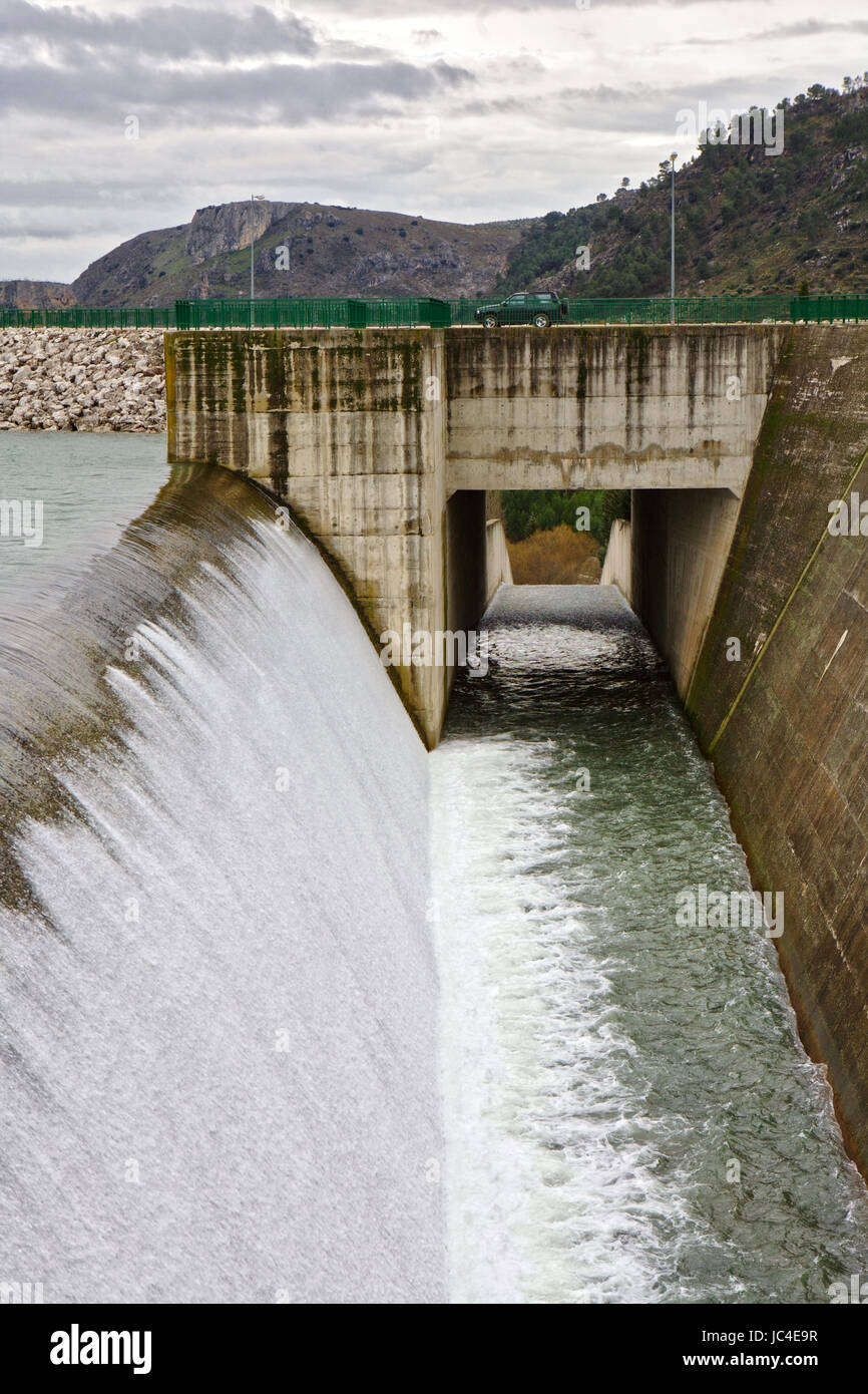 Colomera reservoir releasing water after heavy rains of winter, is ...