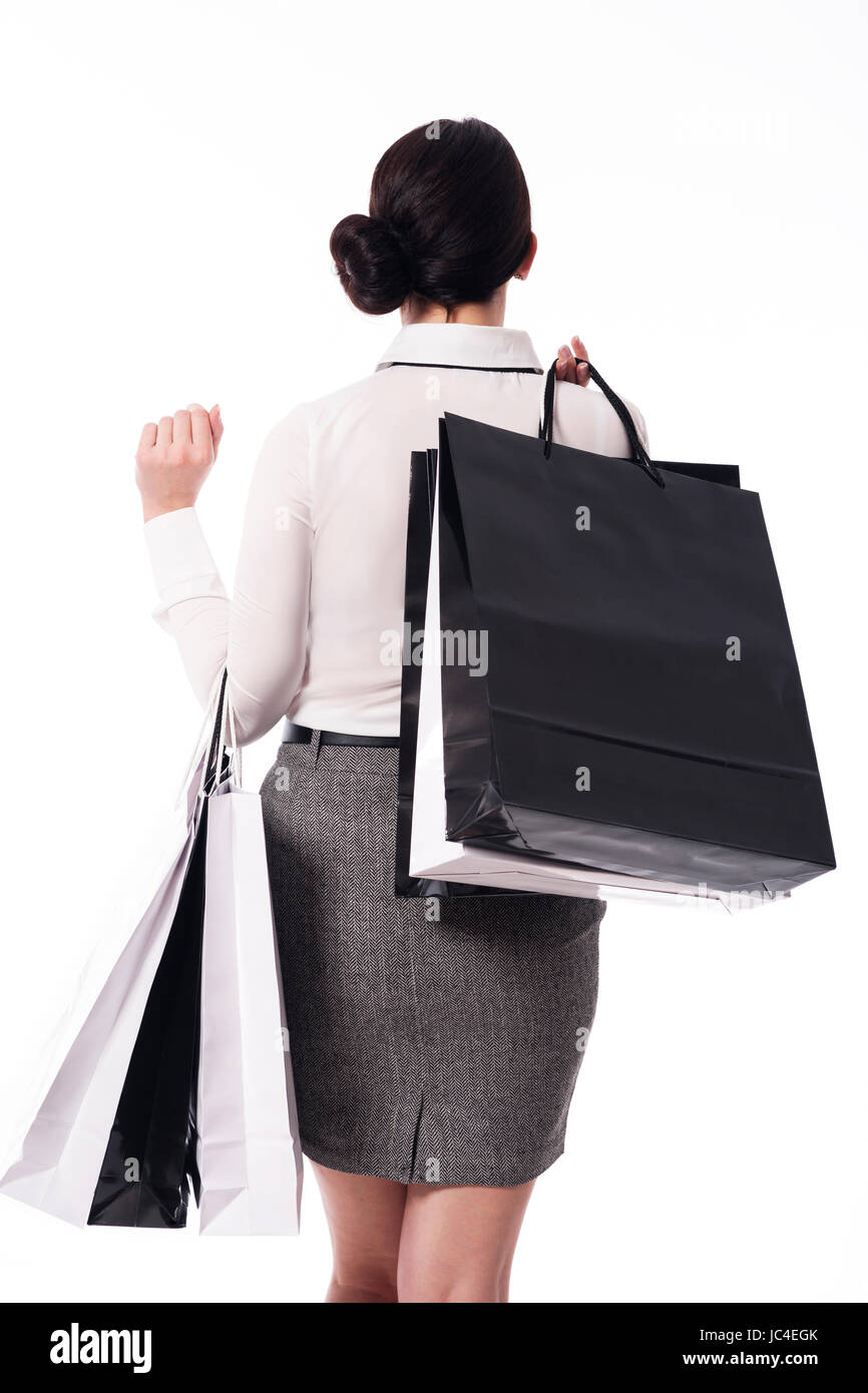 Back shot woman walking shopping hi-res stock photography and images ...