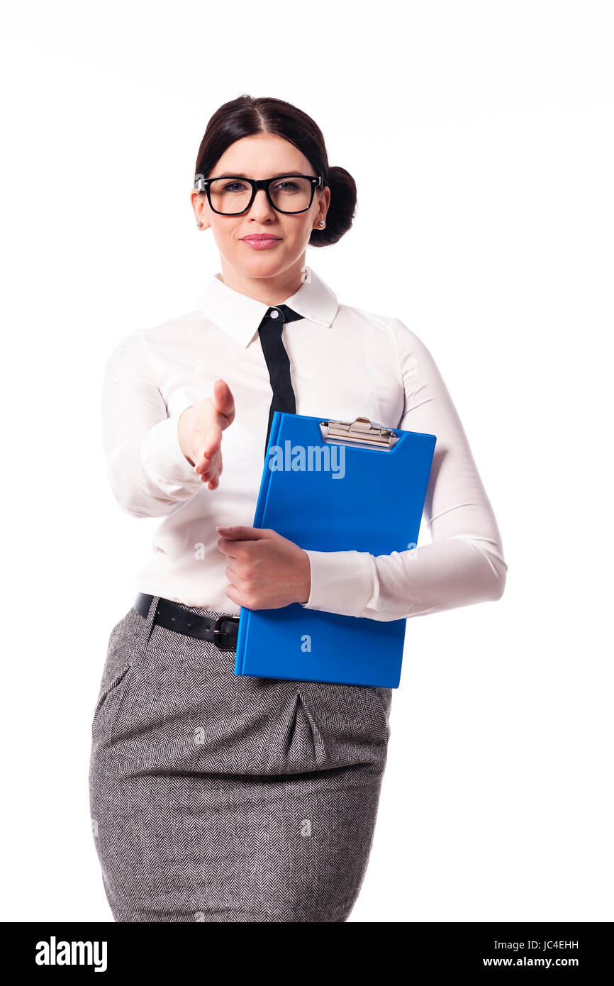 Businesswoman giving hand for handshake Stock Photo - Alamy