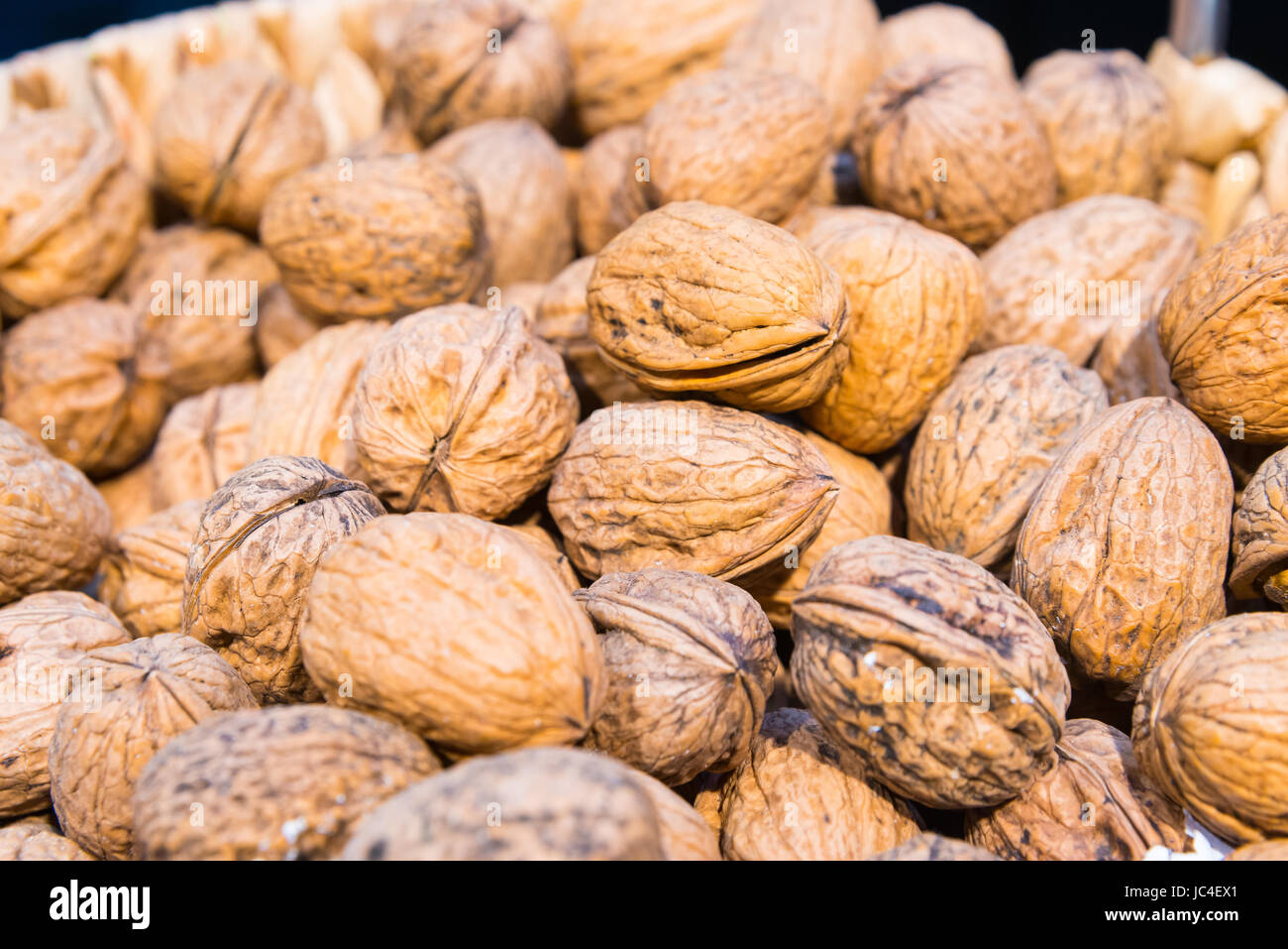 Group of delicious Walnuts with peels Stock Photo - Alamy