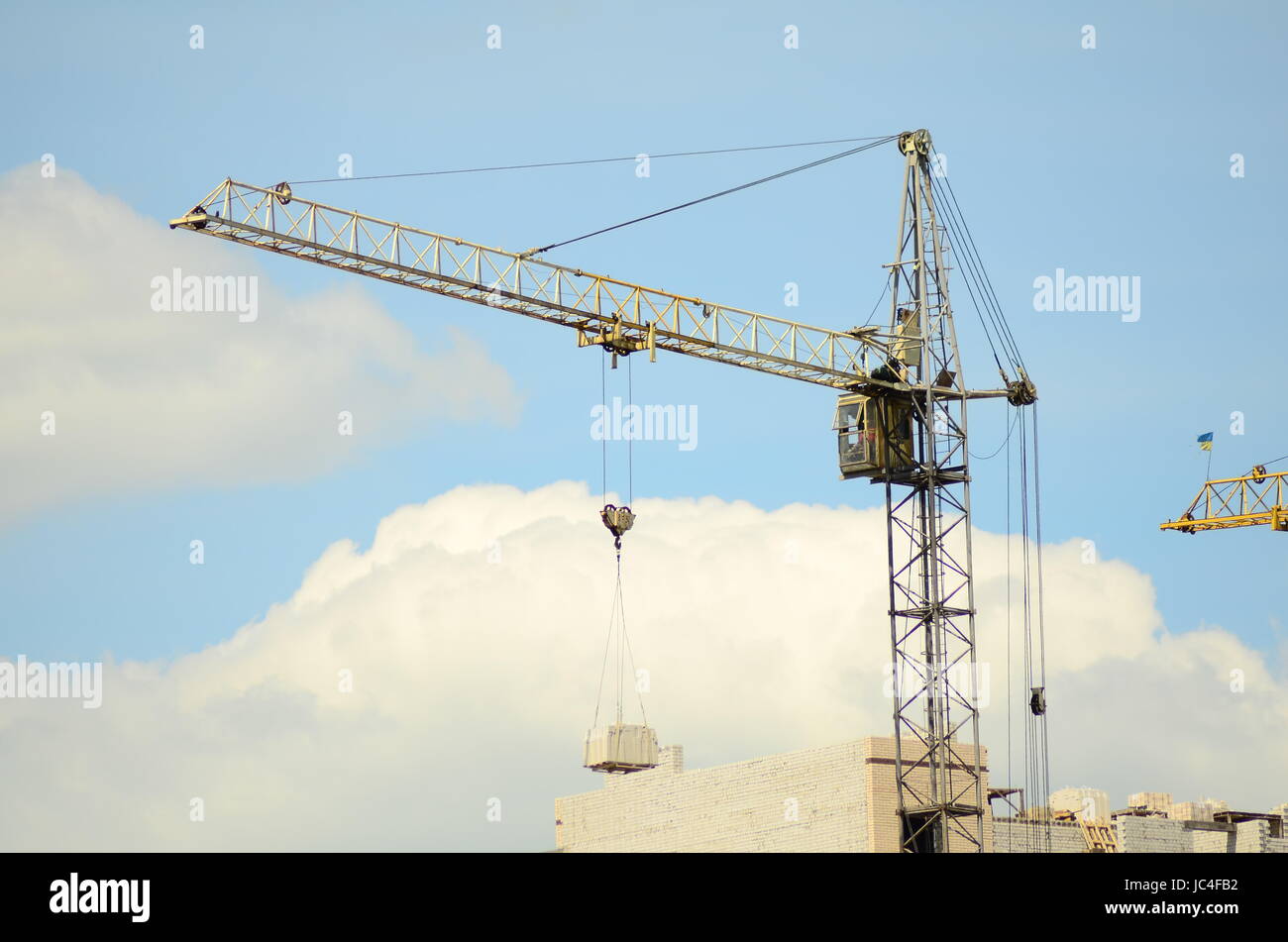 Construction of the new building tower crane Stock Photo - Alamy