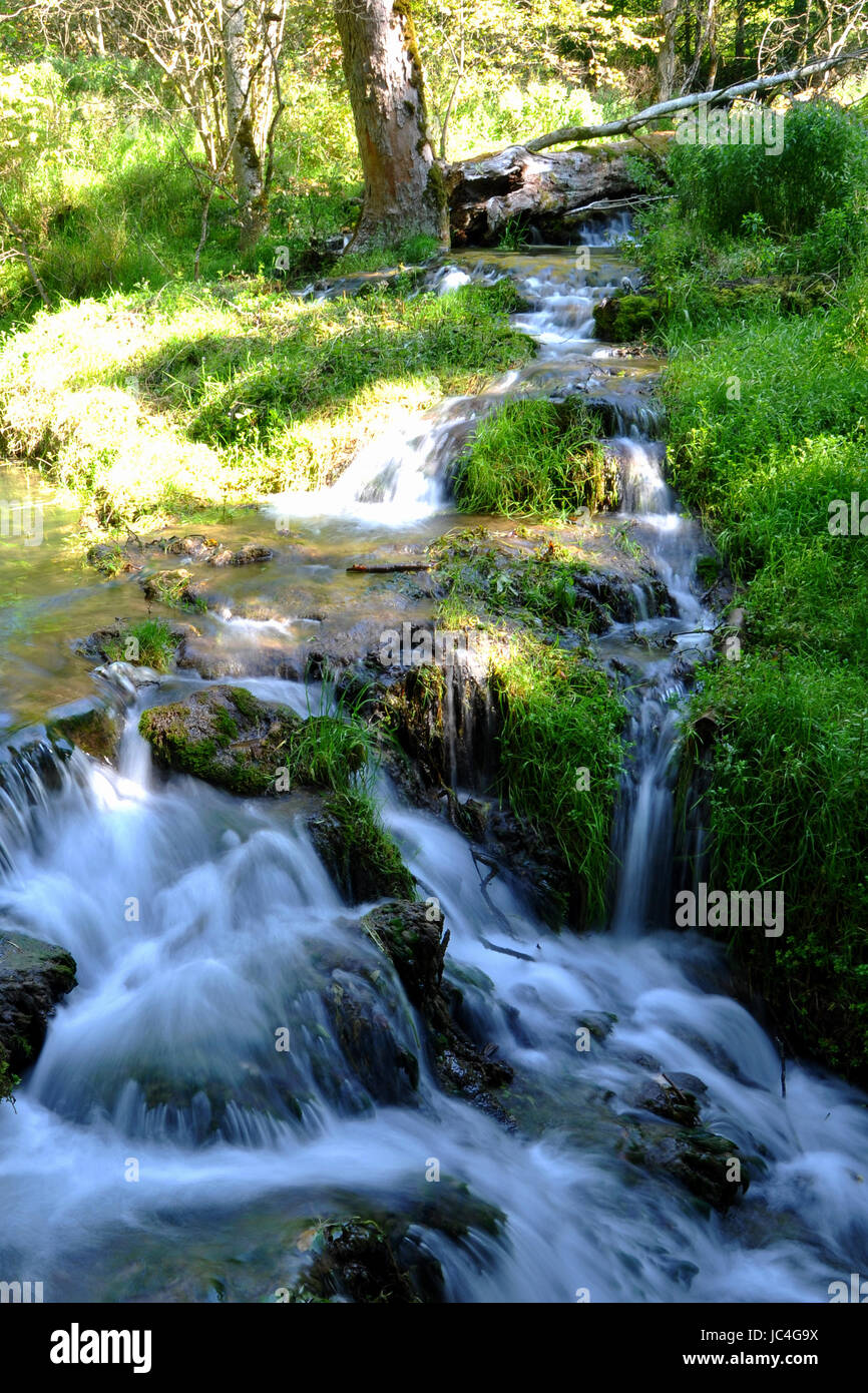Bright light little waterfall hi-res stock photography and images - Alamy