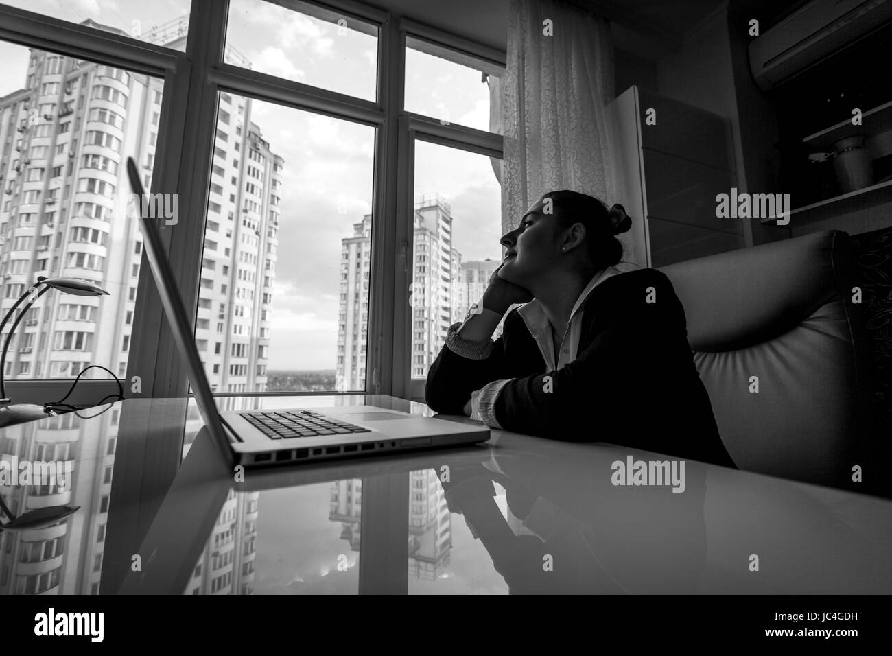 Looking out of office window and sky Black and White Stock Photos ...