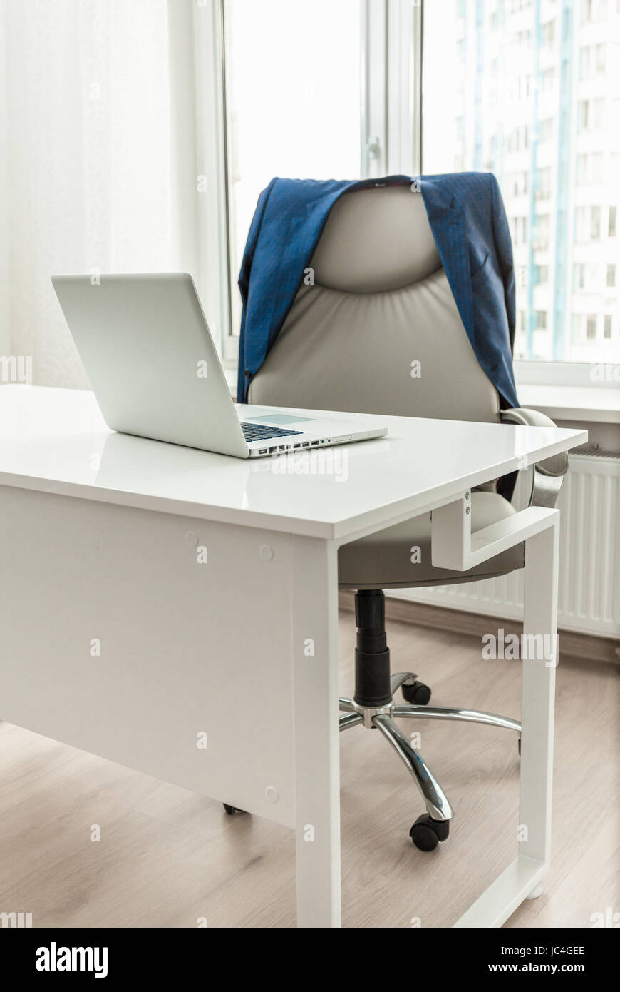 Interior photo of empty working place in office Stock Photo - Alamy