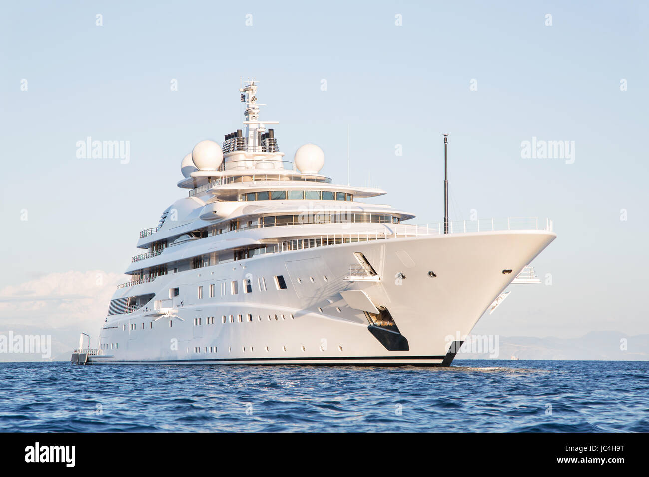 Gigantic big and large luxury mega or super motor yacht on the blue ...