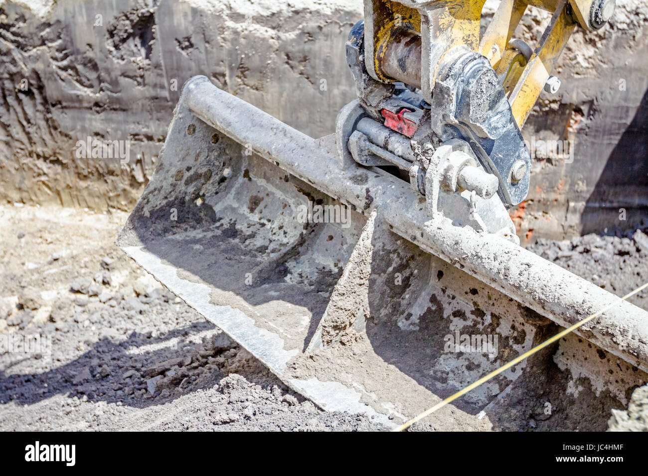 Excavator's tool, bucket, blade on the ground, close up shoot Stock ...