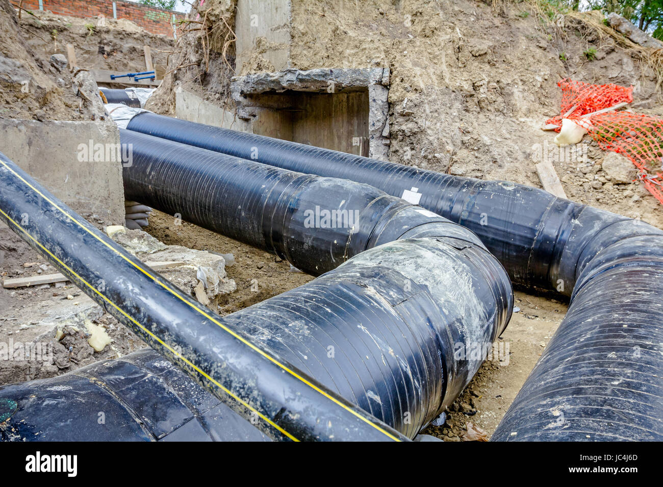 View on assembled and isolated pipeline in trench Stock Photo - Alamy