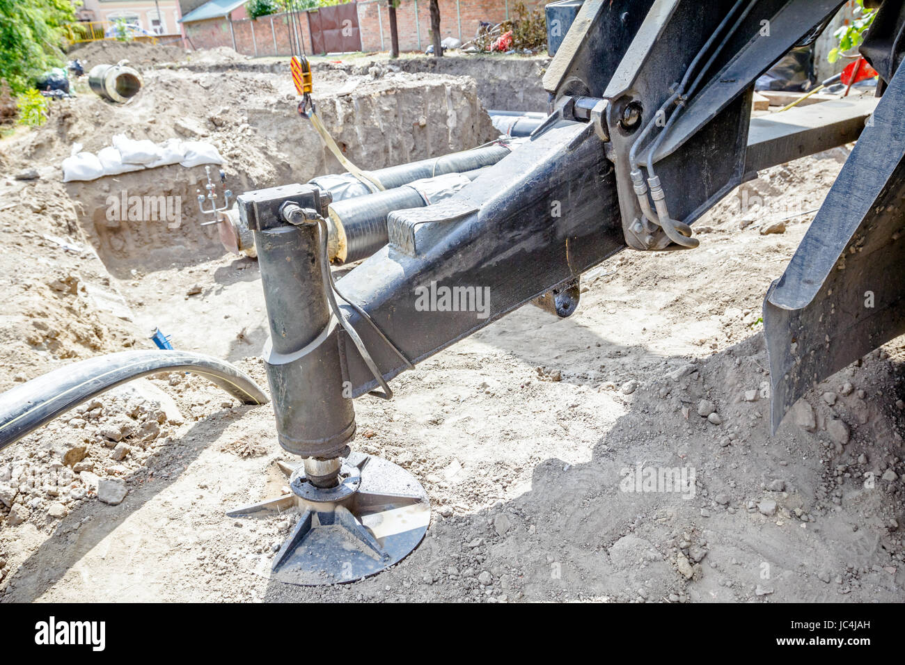 Extended side hydraulic outrigger to increase crane stability until is ...