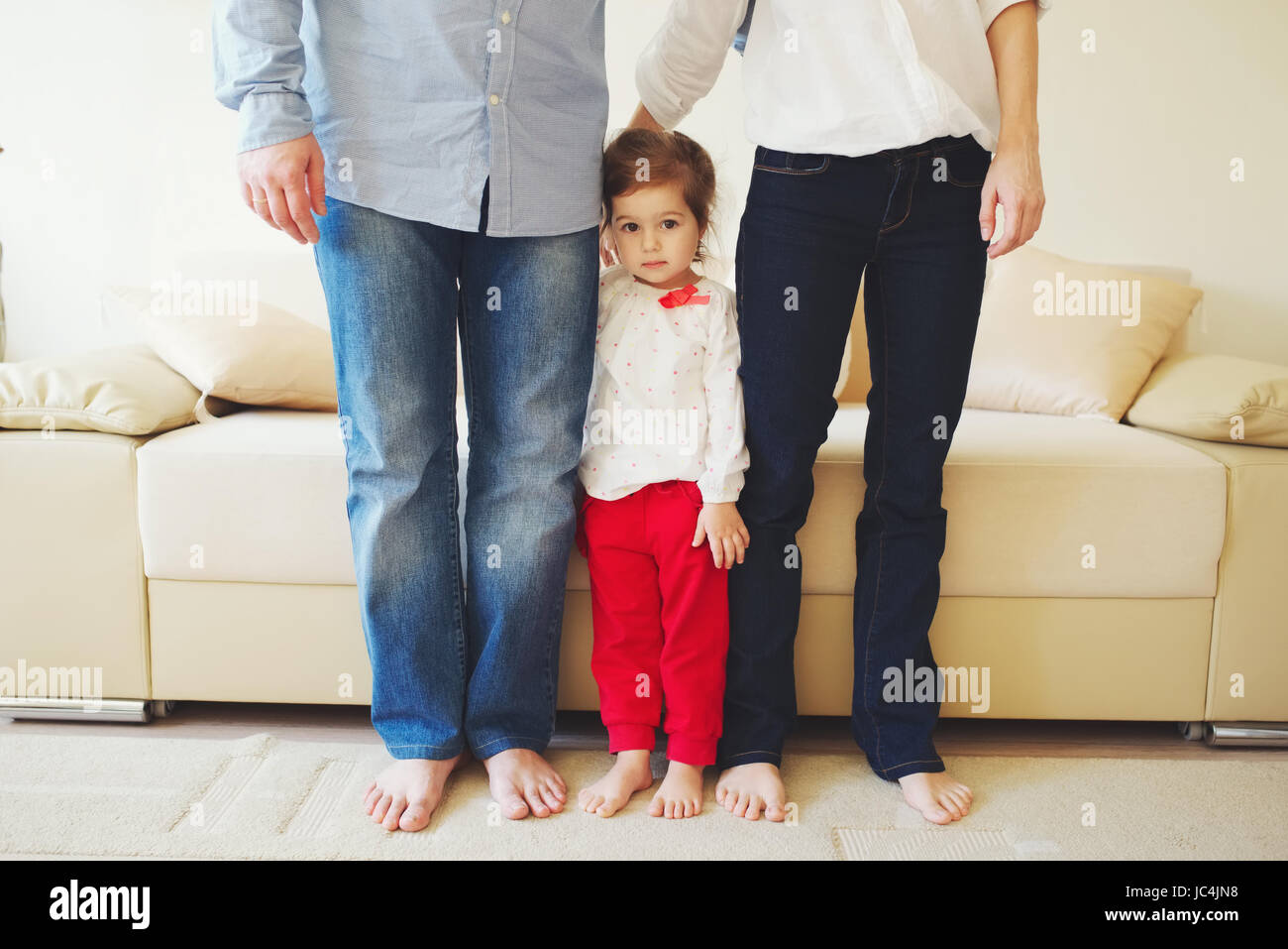 Child hugging parent leg hi-res stock photography and images - Alamy