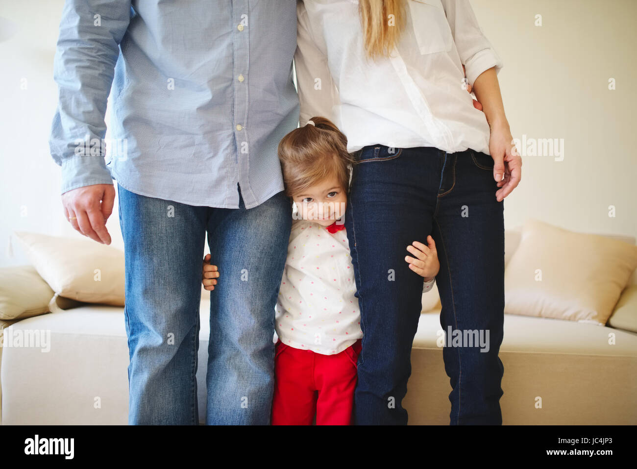 Child hugging parent leg hi-res stock photography and images - Alamy