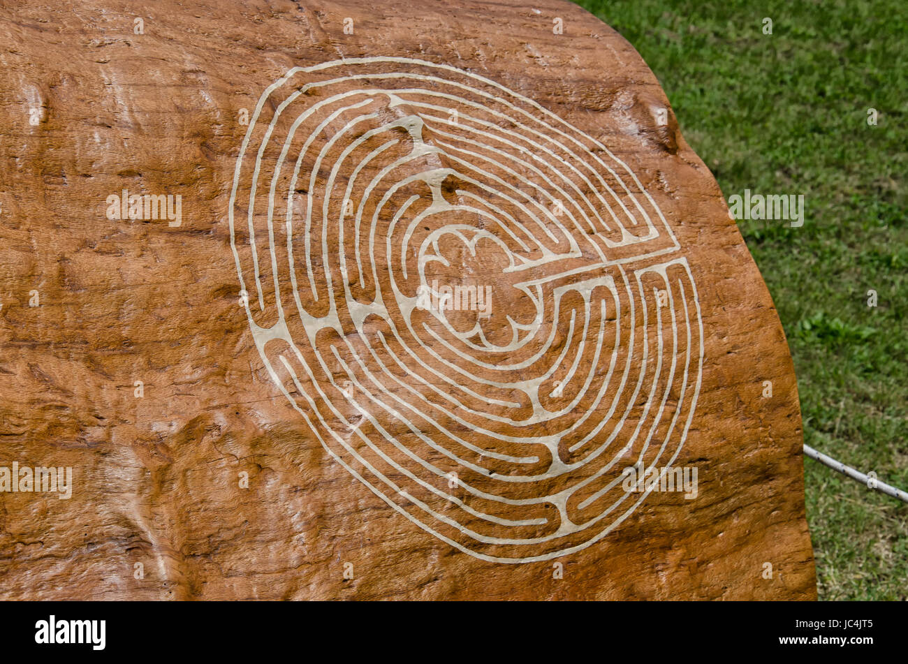 View of mysterious symbol engraved on a tree Stock Photo - Alamy