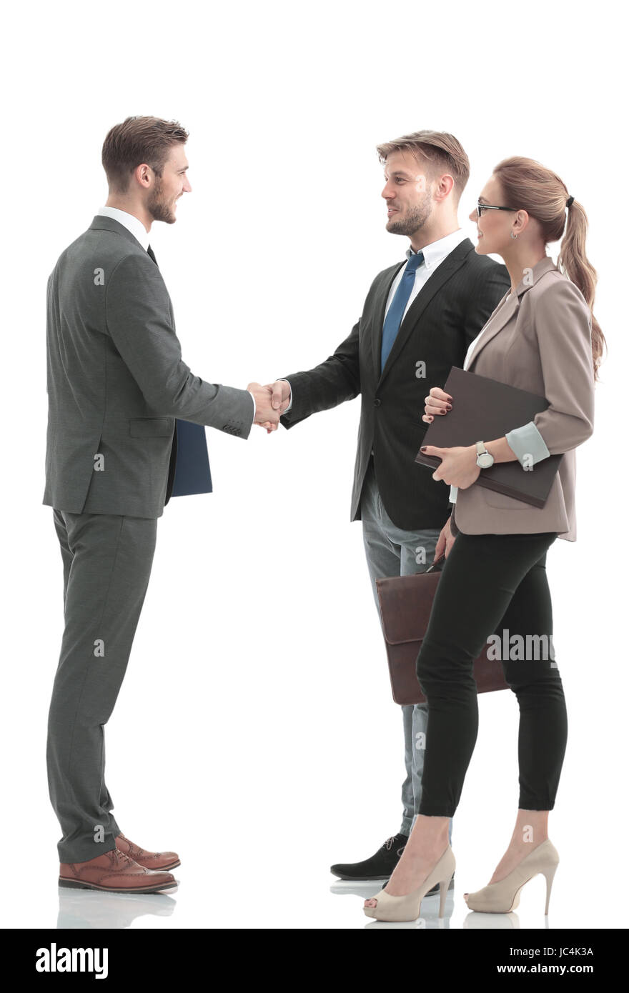 Happy business people making handshake isolated on white Stock Photo ...