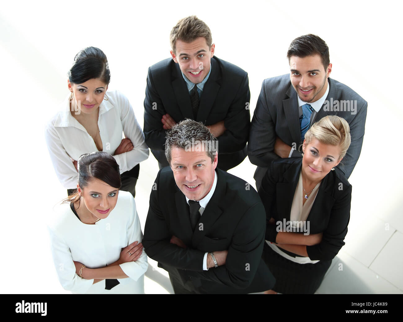 Group of successful business people looking confident Stock Photo - Alamy