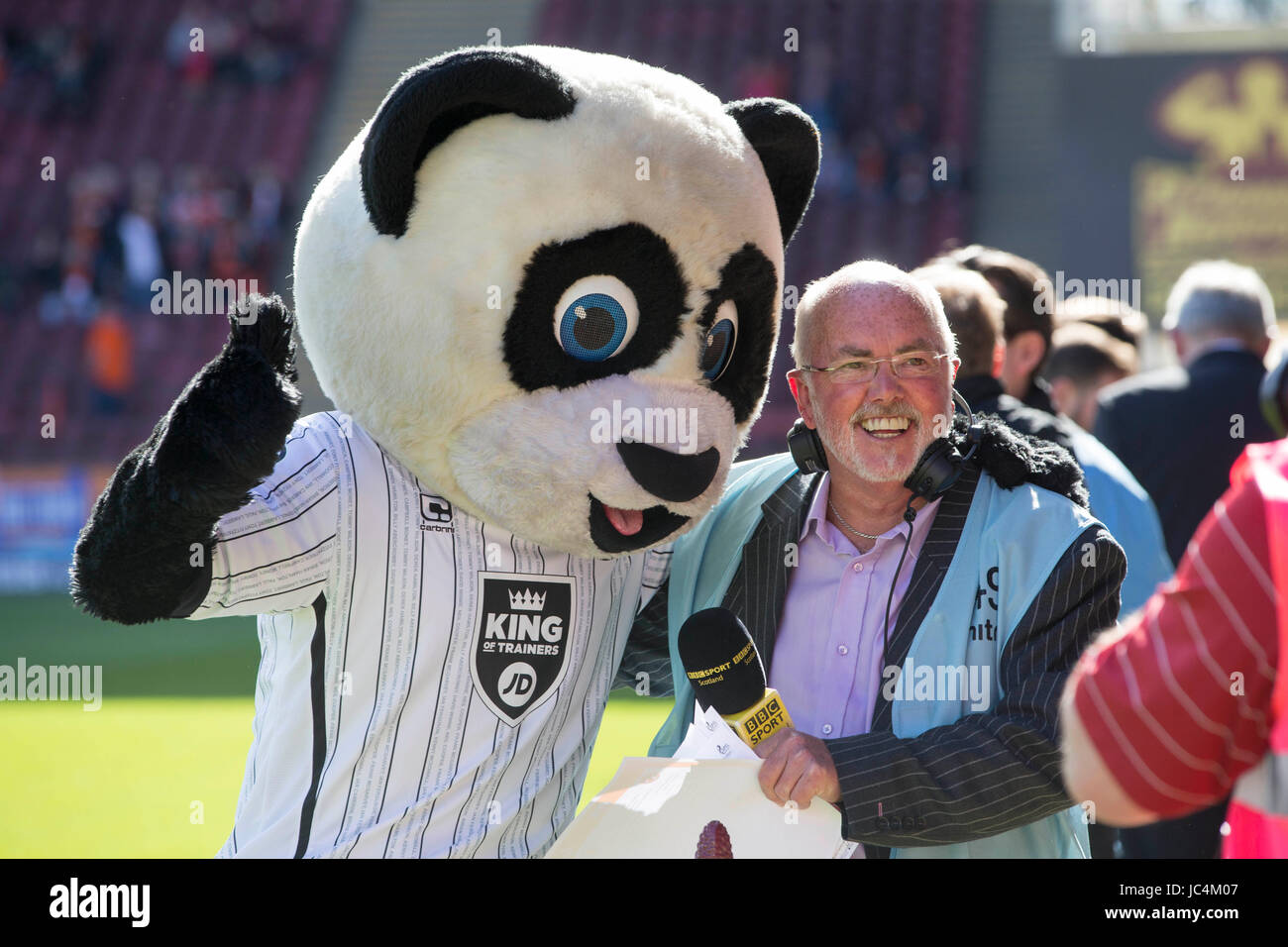 St Mirren mascot Paisley panda with BBC reporter Chic Young during the ...