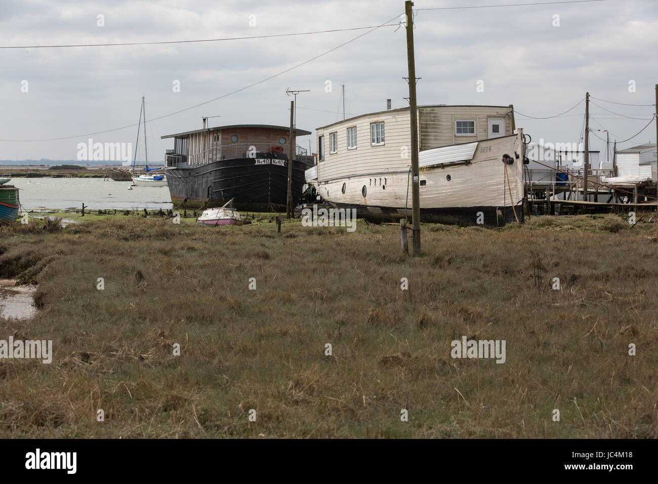 Houseboats moored at West Mersea, Colchester Essex Stock Photo - Alamy