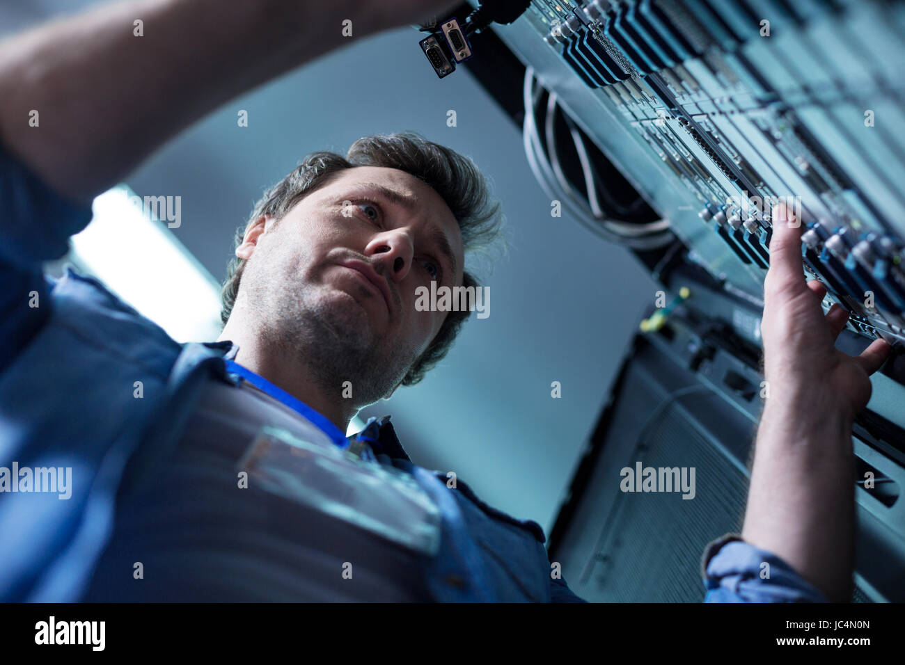 Expert data center technician hi-res stock photography and images - Alamy