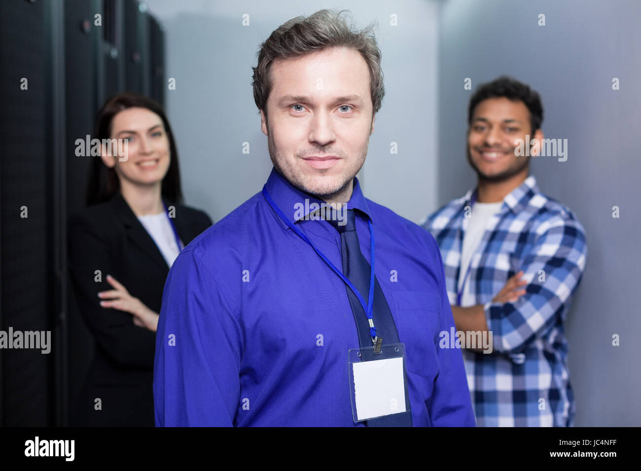 Delighted team in data center hi-res stock photography and images - Alamy