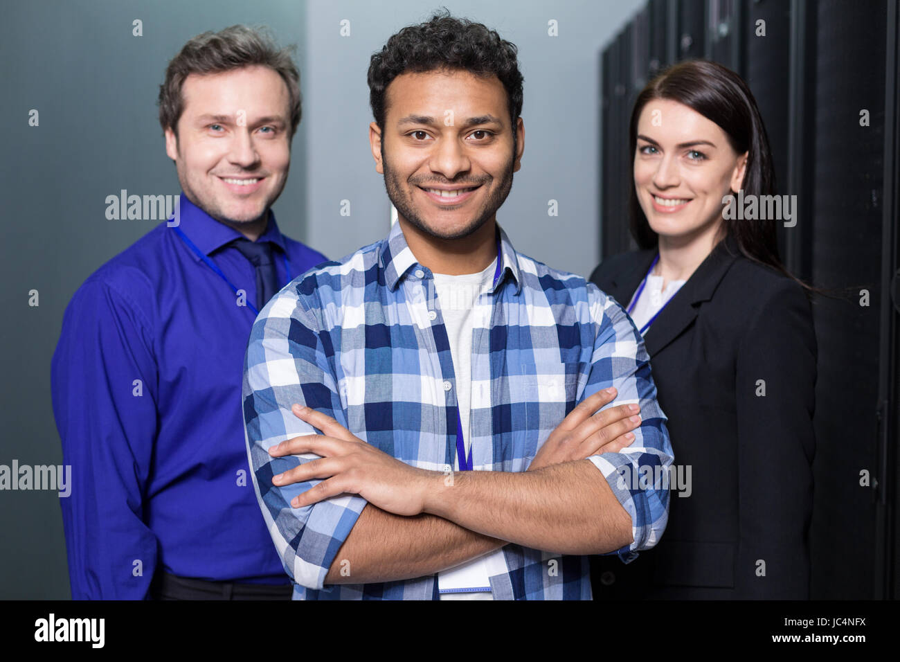Happy joyful team standing together Stock Photo - Alamy