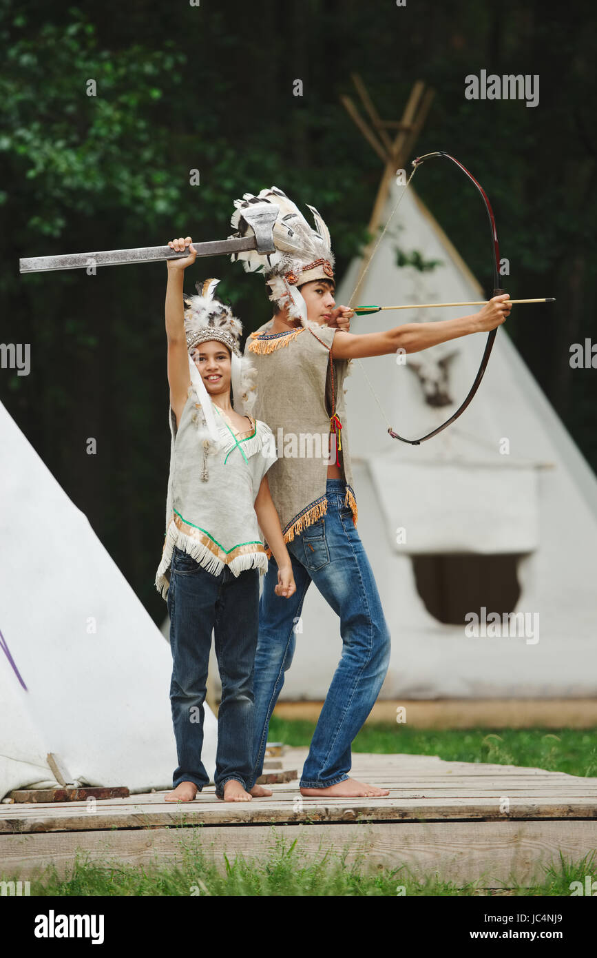 happy children playing native american Stock Photo - Alamy