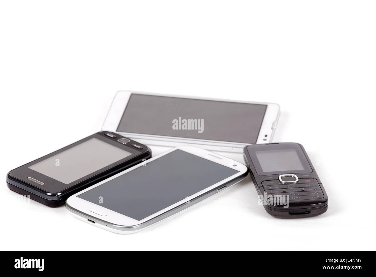 collection of cell phones, old design and new smart phones isolated on ...