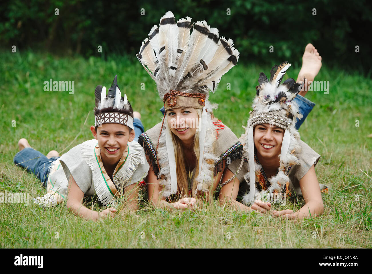 happy children playing native american Stock Photo - Alamy