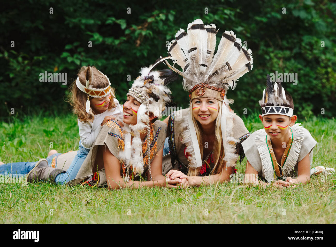 happy children playing native american Stock Photo - Alamy