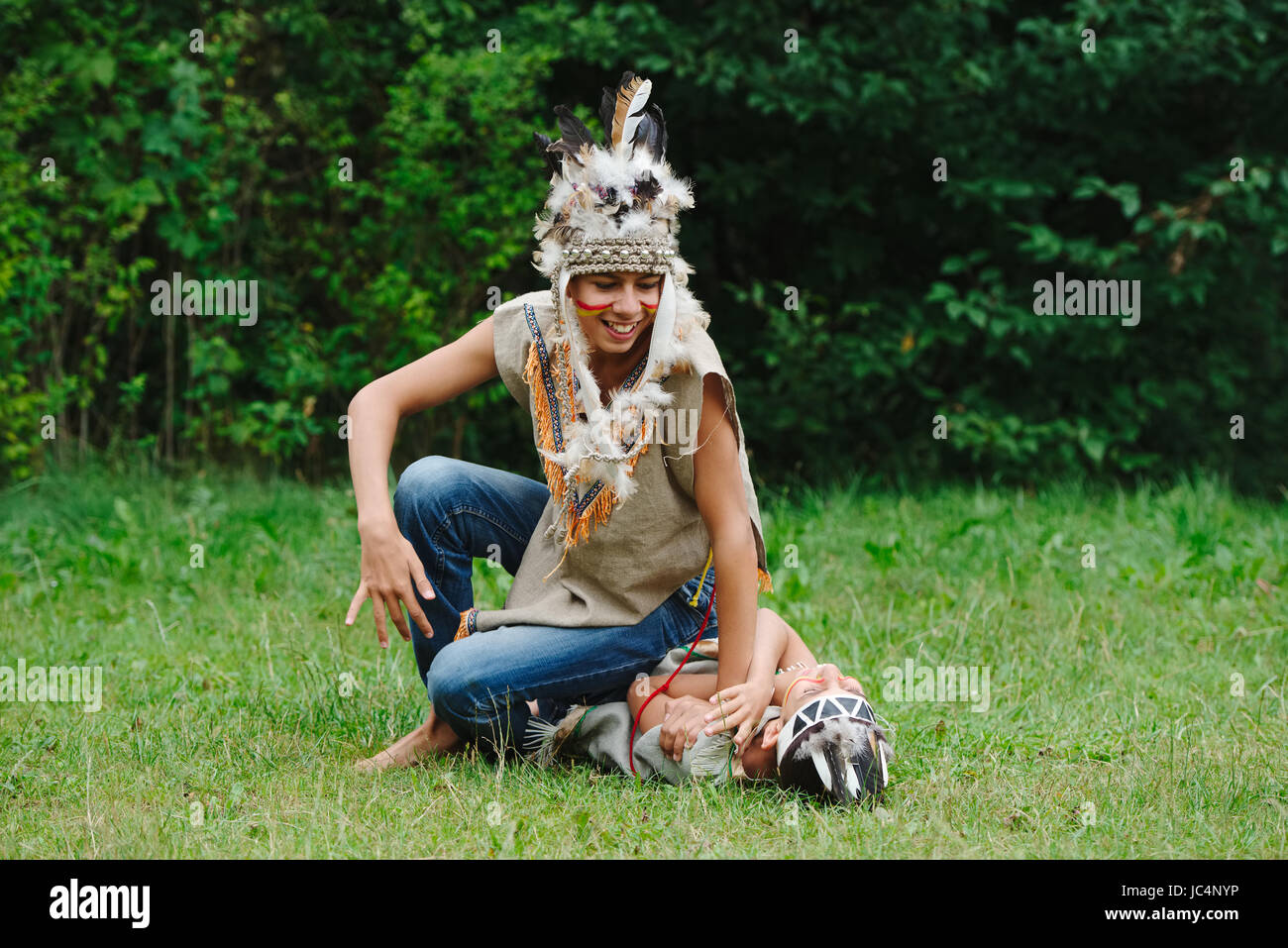 happy children playing native american Stock Photo - Alamy