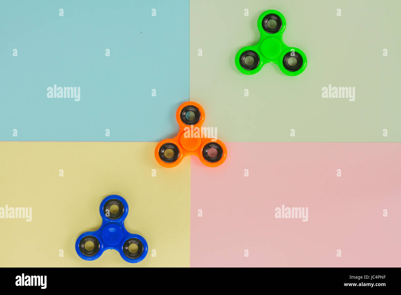 trendy fidget spinners - styled flat lay scene with set of generic ...