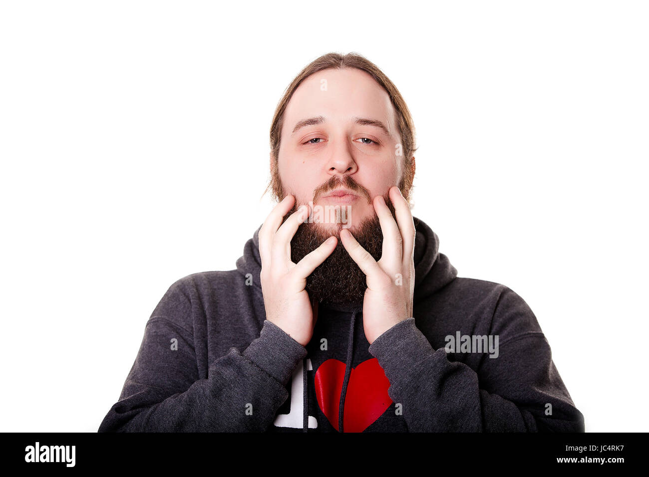 portrait of thinking stylish young man touch his beard Stock Photo - Alamy