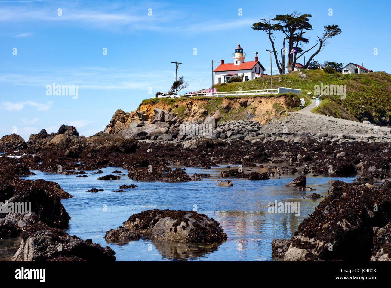 Battery Point Lighthouse which sits outside the Crescent City harbor ...