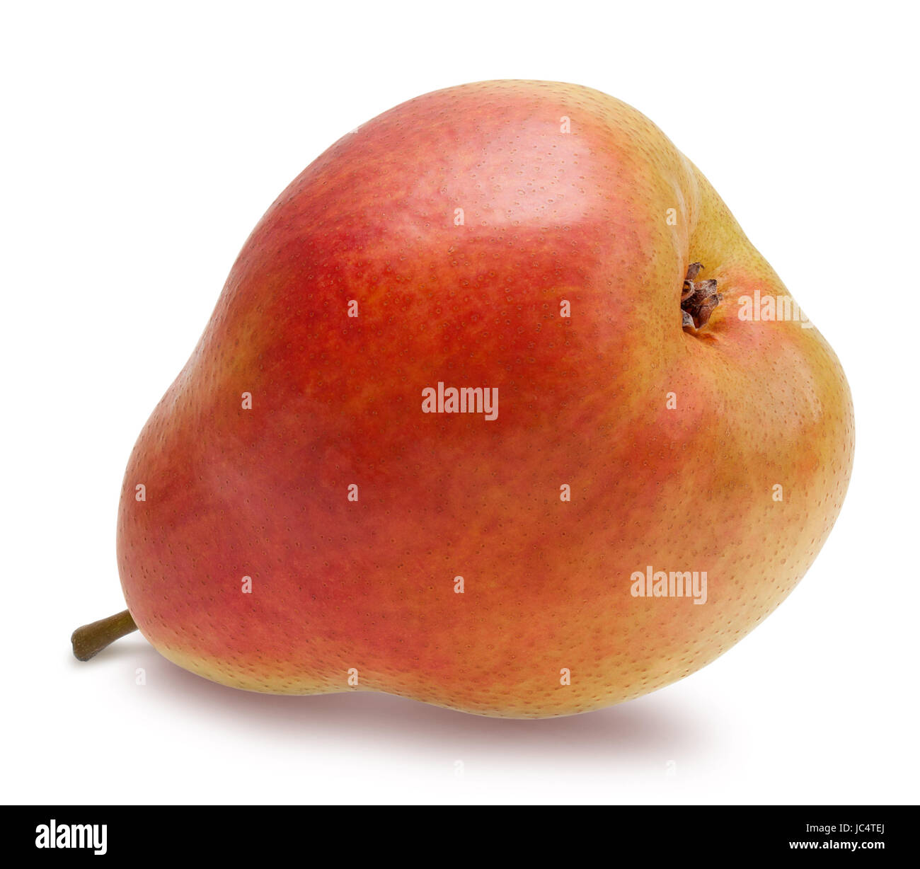Ripe red pear lying on its side isolated over white, clipping path ...