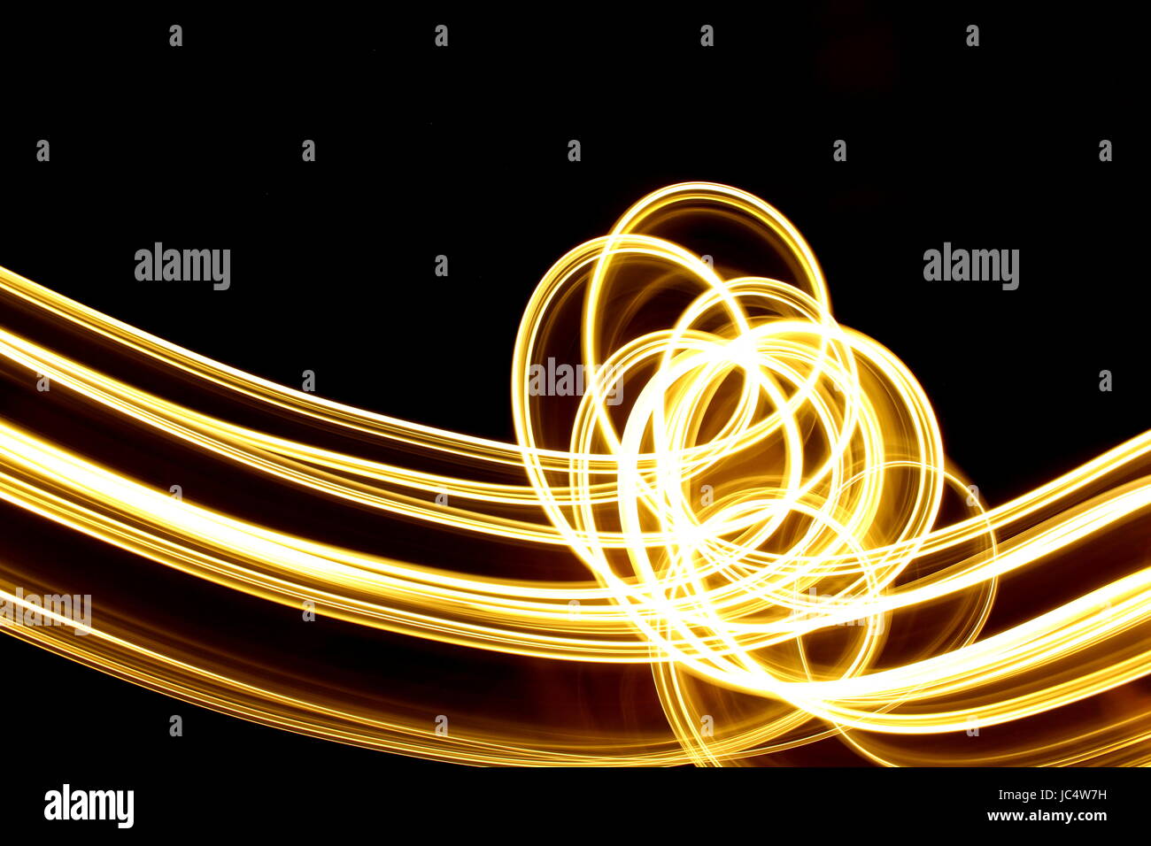 Gold Light Painting Photography, parallel lines swirls, and loops ...