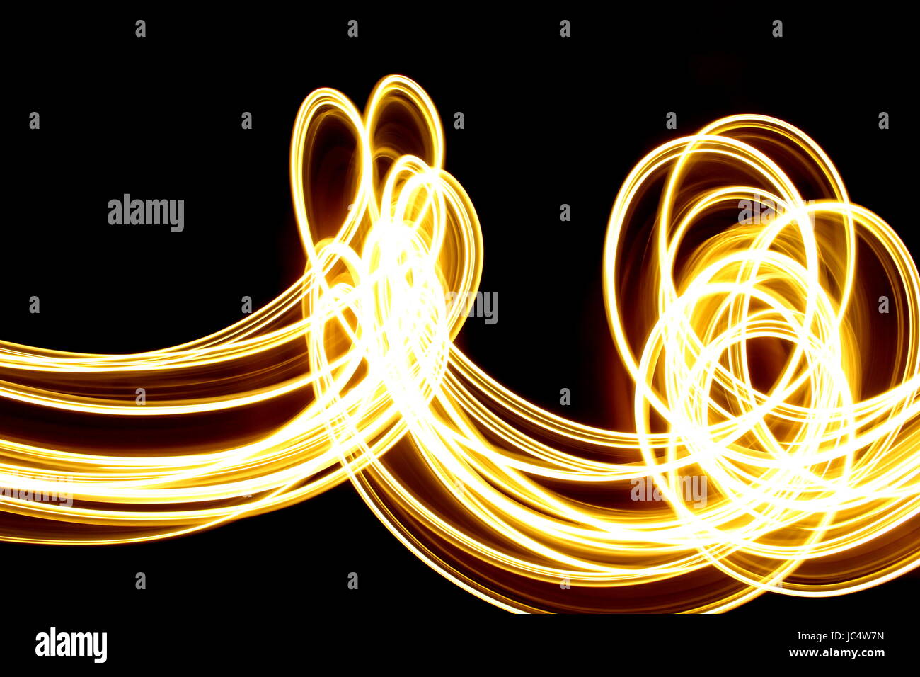 Gold Light Painting Photography, parallel lines swirls, and loops ...