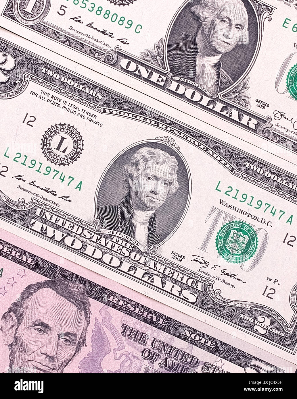 American dollar bills of different denominations abstract background ...