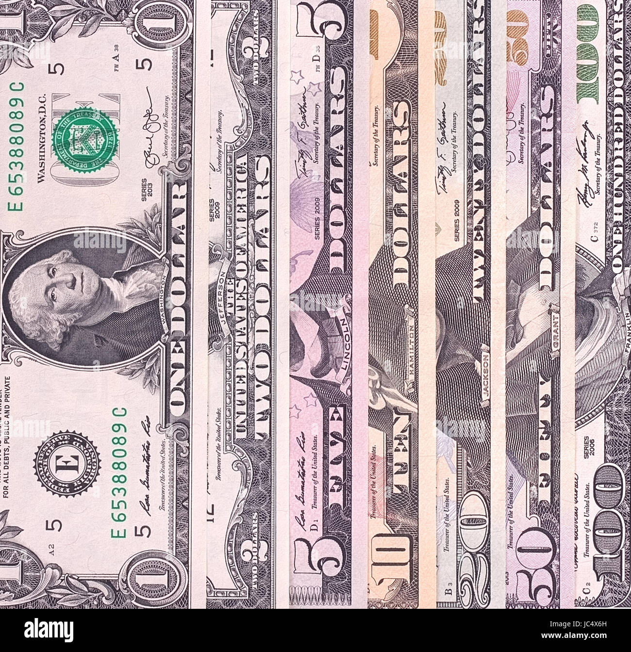 American dollar bills of different denominations abstract background ...