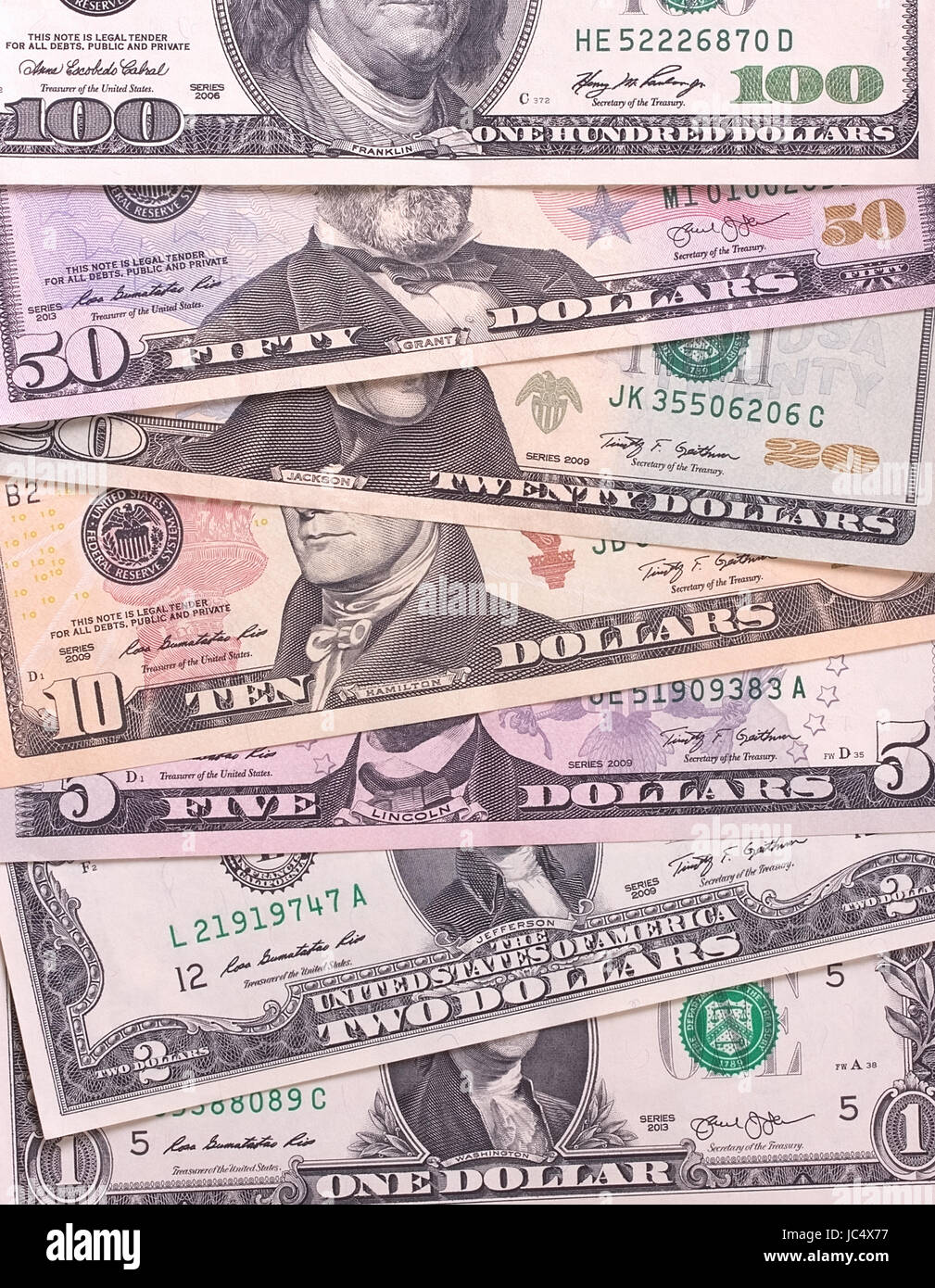 American dollar bills of different denominations abstract background ...