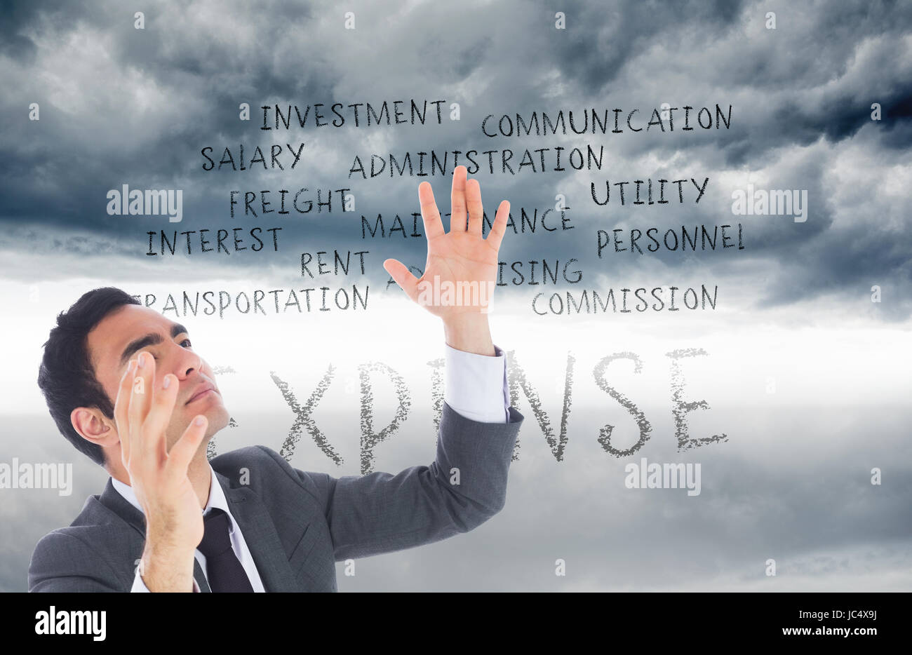 Composite image of unsmiling businessman with arms raised Stock Photo ...