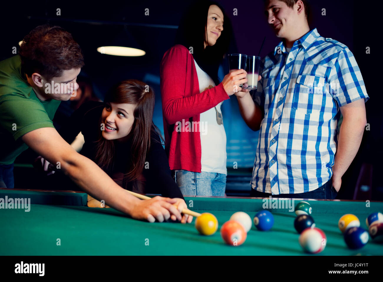 Woman bending over table holding hi-res stock photography and images ...