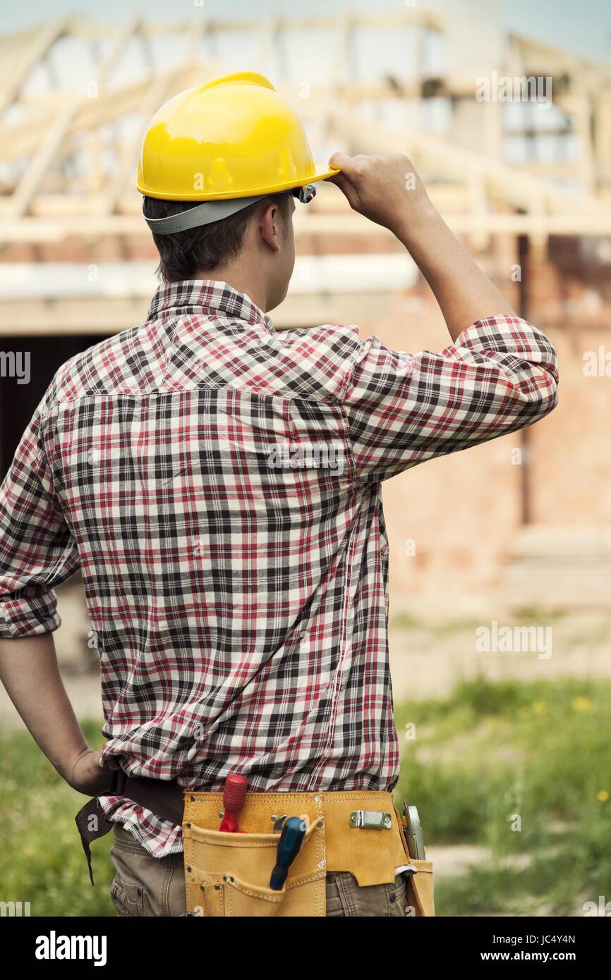 Back view young carpenter hi-res stock photography and images - Alamy