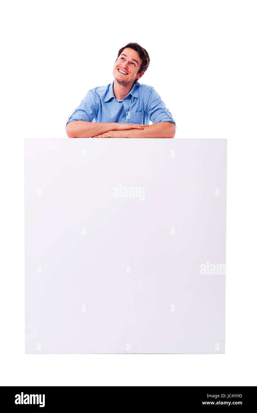 Handsome man thinking behind Cut Out Stock Images & Pictures - Alamy