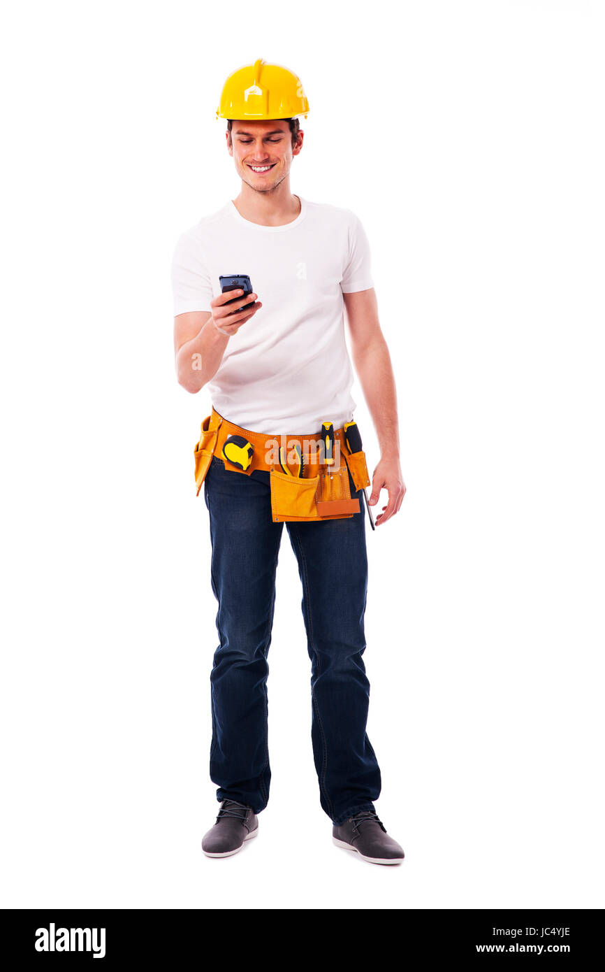 Construction worker looking at phone Cut Out Stock Images & Pictures ...