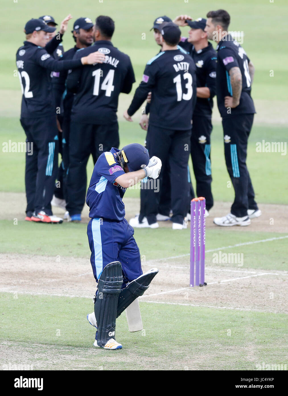 Yorkshire's Adam Lyth leaves the pitch after being caught out from the ...