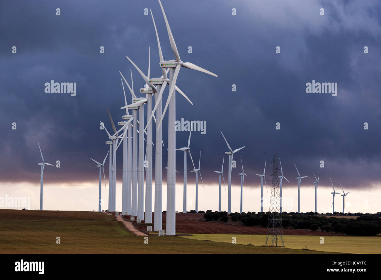 Iberdrola Wind Turbine - Eolic Generator with stormy clouds in Sisante ...