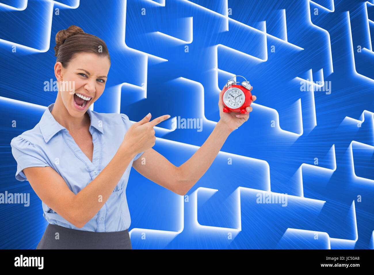 Composite image of businesswoman indicating alarm clock with finger ...