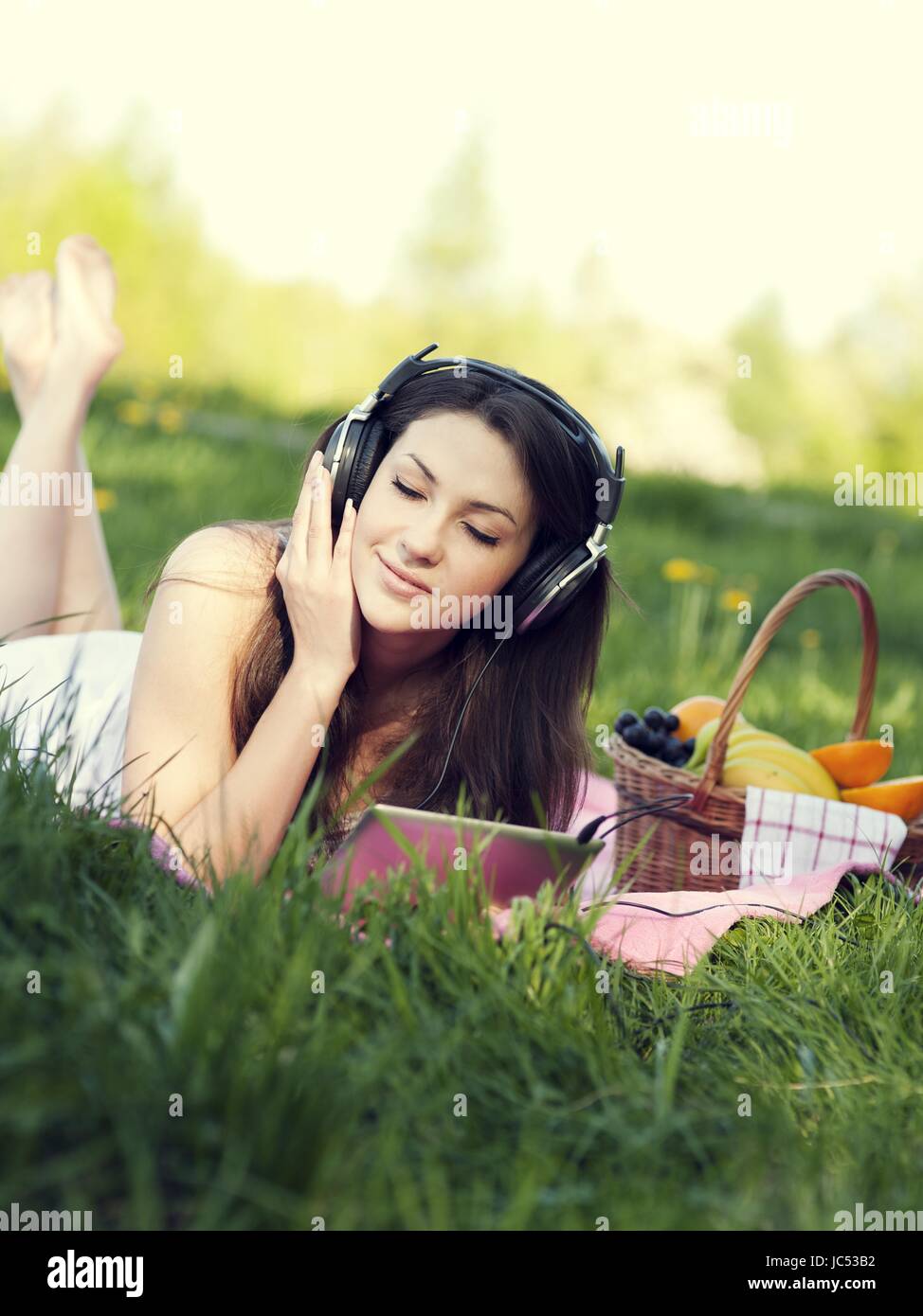 Picnic scene woman lying on hi-res stock photography and images - Alamy